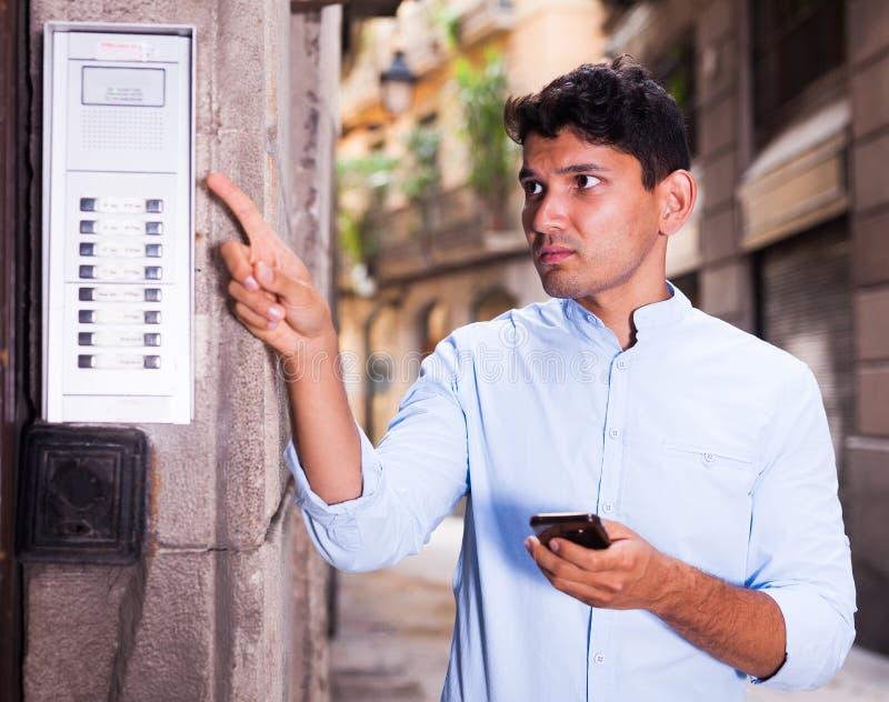 Man Looking for House at the Right Address in City Stock Photo - Image ...