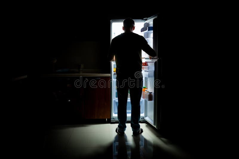 A Man is Looking Inside an Open Refrigerator. Ai Generated. Stock ...