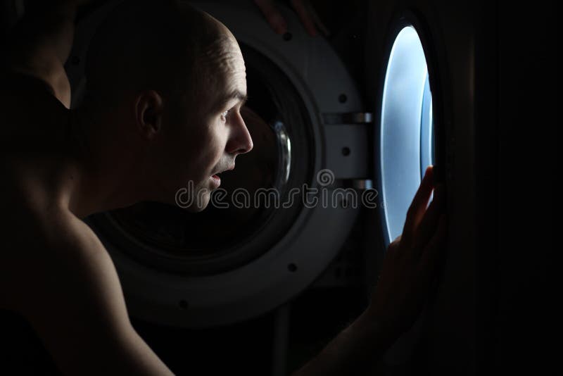 Man Looking Inside Washing Machine Stock Photo - Image of examining ...