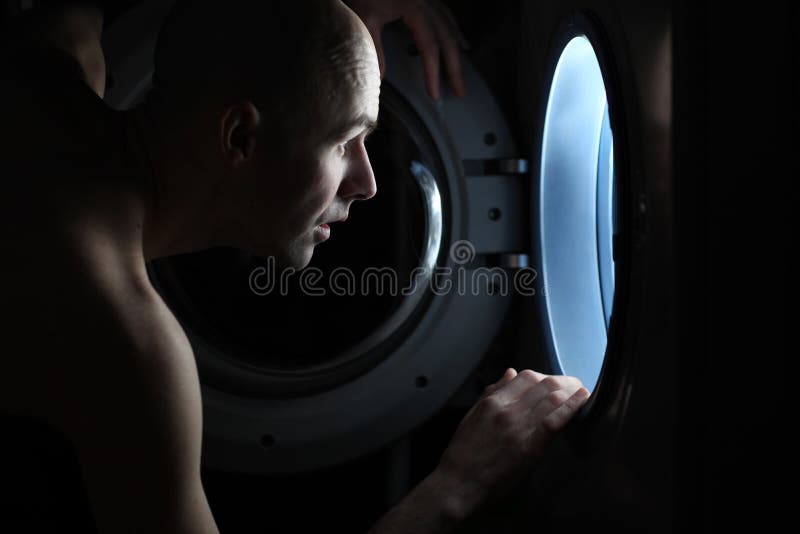 Man Looking Inside Washing Machine Stock Image - Image of machine, boat ...