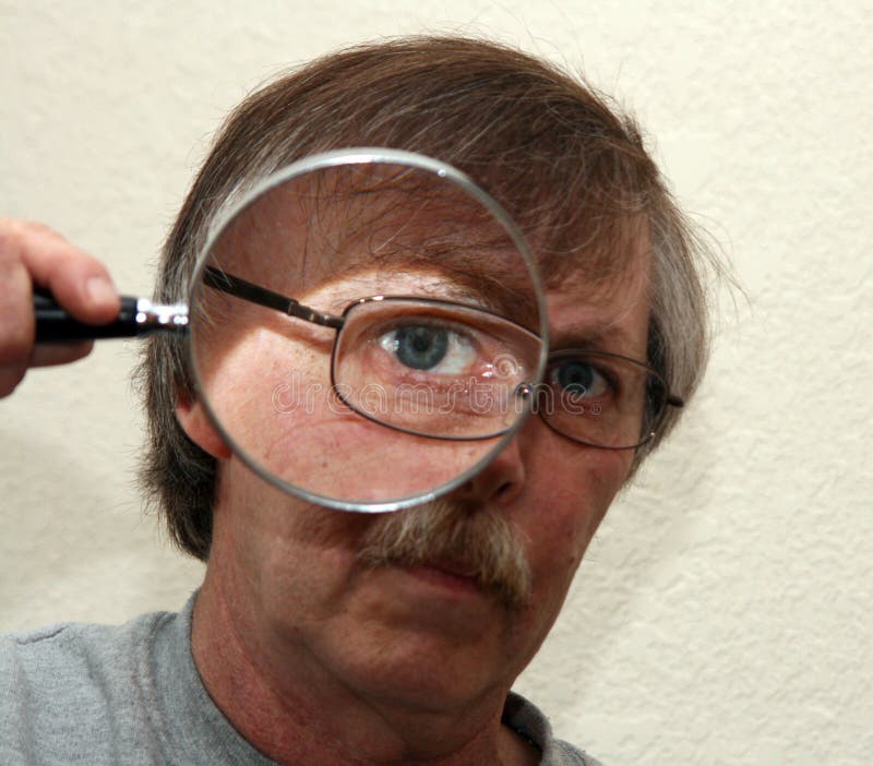 Man Looking through Magnifier Stock Photo - Image of distortion ...