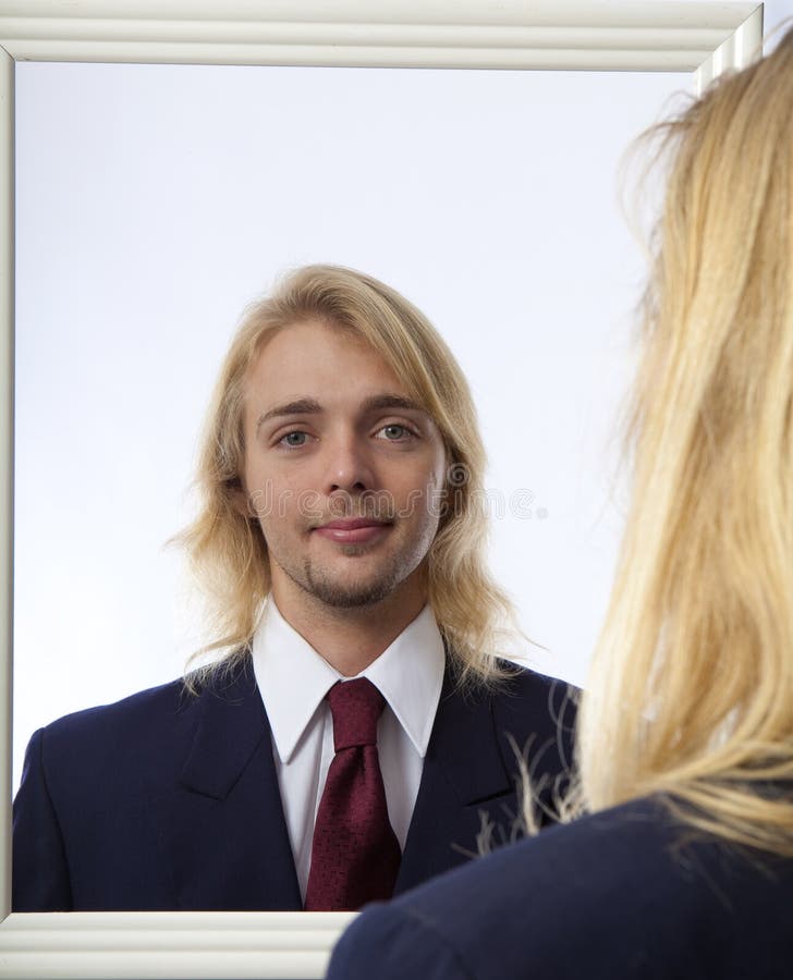 Man looking in a mirror stock image. Image of reflection - 14058971