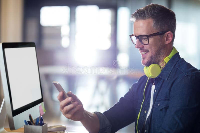 Man Looking at Mobile Phone Stock Photo - Image of occupation ...