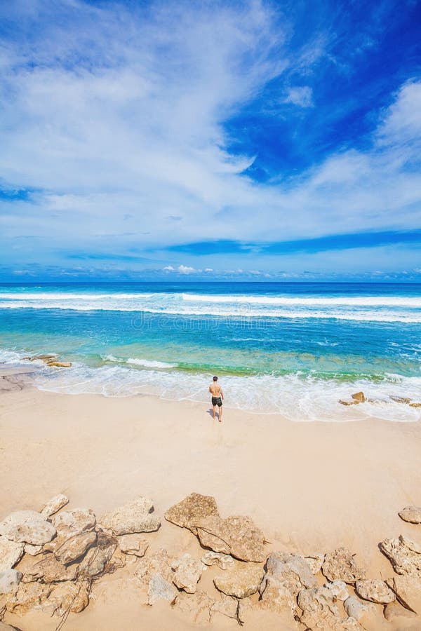 Man looking at the ocean stock image. Image of alone - 79707121