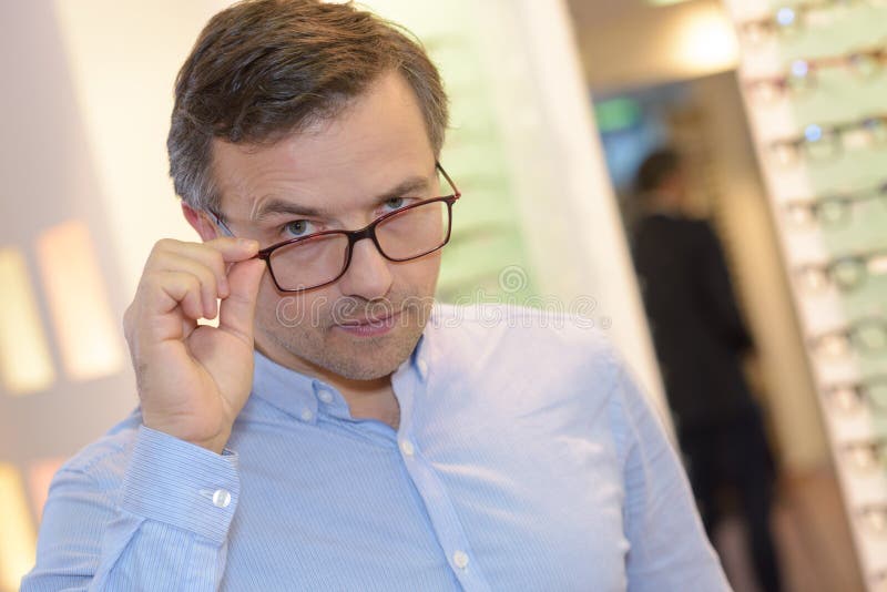 Man Looking Over Top Spectacles Stock Image - Image of expression ...