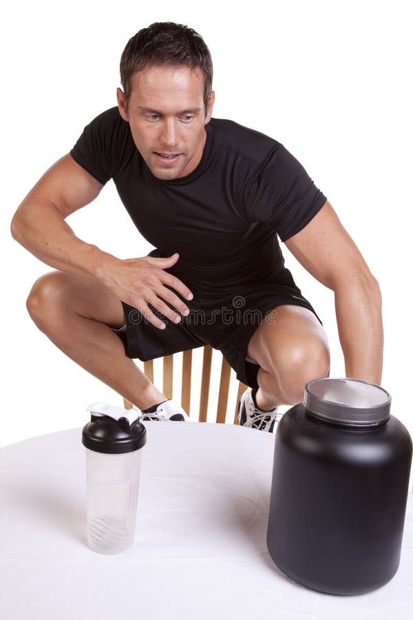 Man Looking at Protein Drink Stock Image - Image of muscles, beauty ...