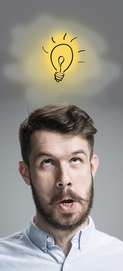 Man Reminiscing Looking at an Old Photo Album. Stock Photo - Image of ...