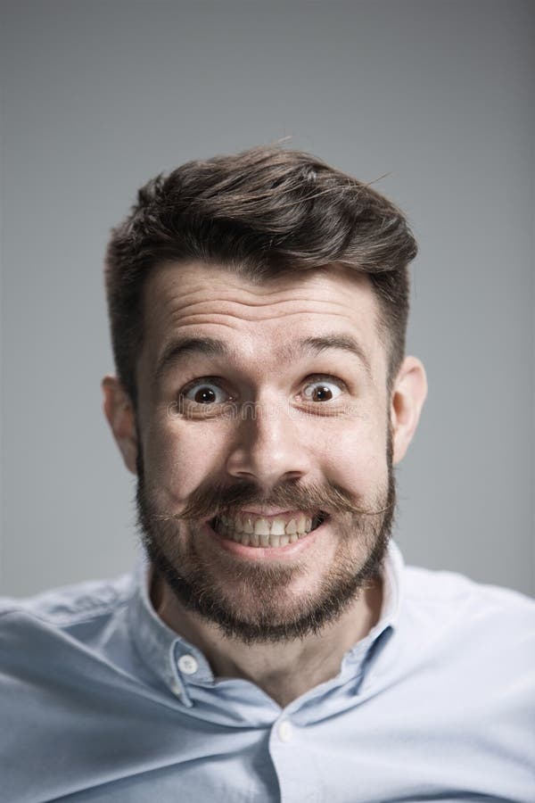 Portrait Of A Young Man Looking Scared And Shocked. Human Expressions ...