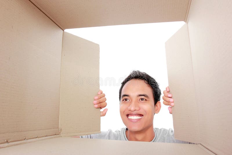 Man Looking for Something Inside Box Stock Photo - Image of opened ...