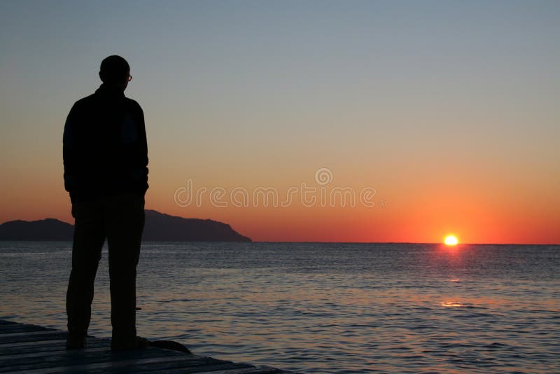 Man looking on sunset stock photo. Image of motivational - 1759678