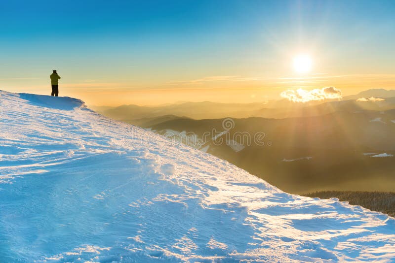 Man looking at sunset stock photo. Image of extreme - 109040200