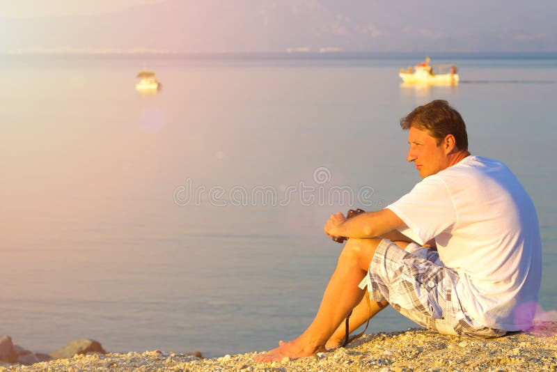 Man Looking Towards the Sea Stock Image - Image of boat, lens: 47021169