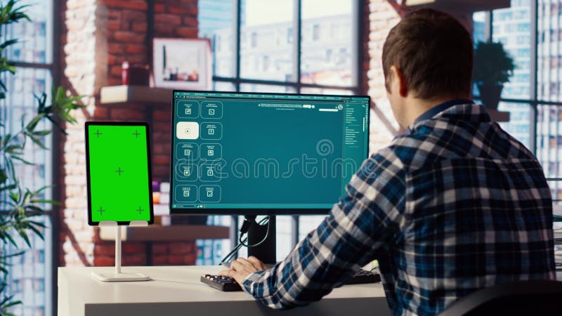 Man Looking at Tutorial on Mockup Tablet To Learn How To Use Text To ...