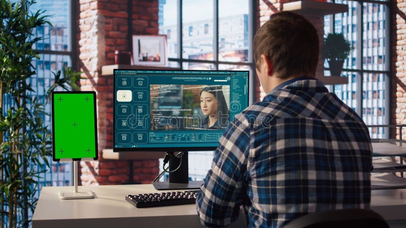 Man Looking at Tutorial on Mockup Tablet To Learn How To Use Text To ...