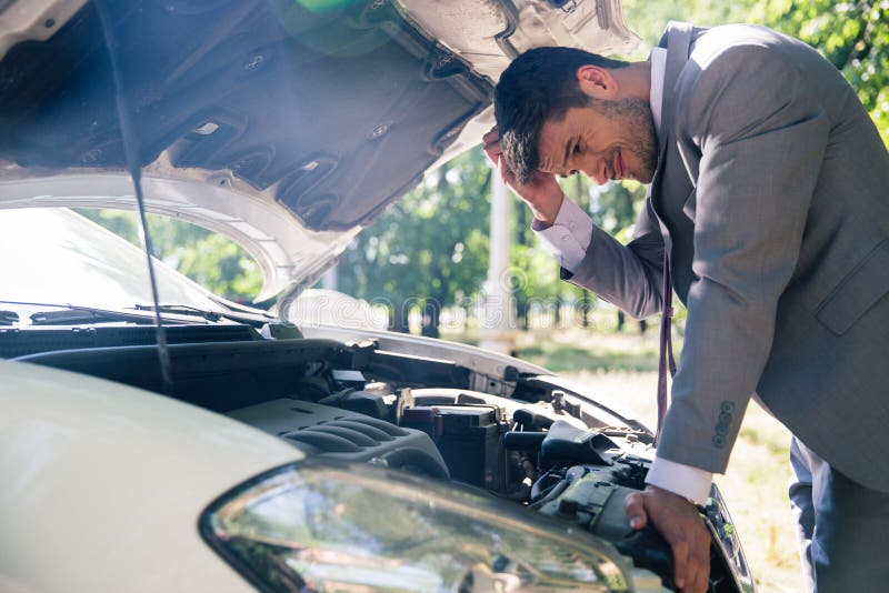 Man Looking Under the Hood of Car Stock Photo - Image of people ...