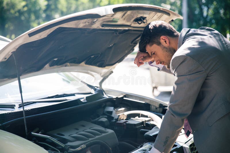 Man Looking Under the Hood of Car Stock Photo - Image of forest ...
