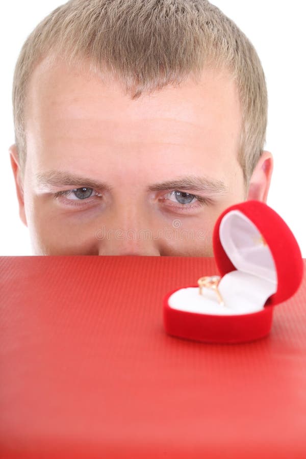 Man Looking at Wedding Ring. Focus on Ring Stock Photo - Image of ...
