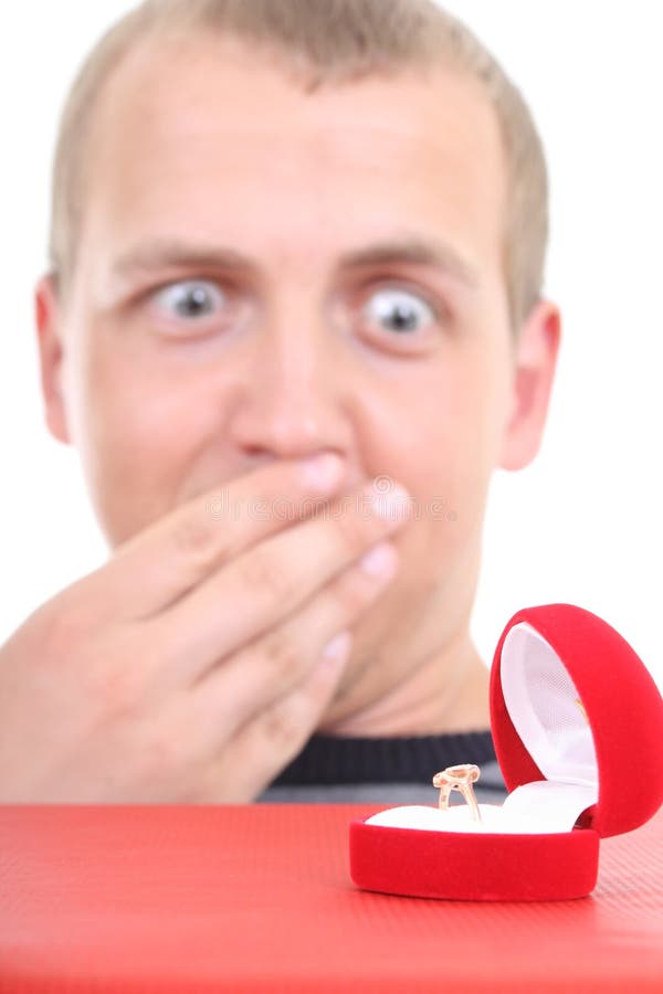 Man Looking at Wedding Ring. Focus on Ring Stock Image - Image of ...