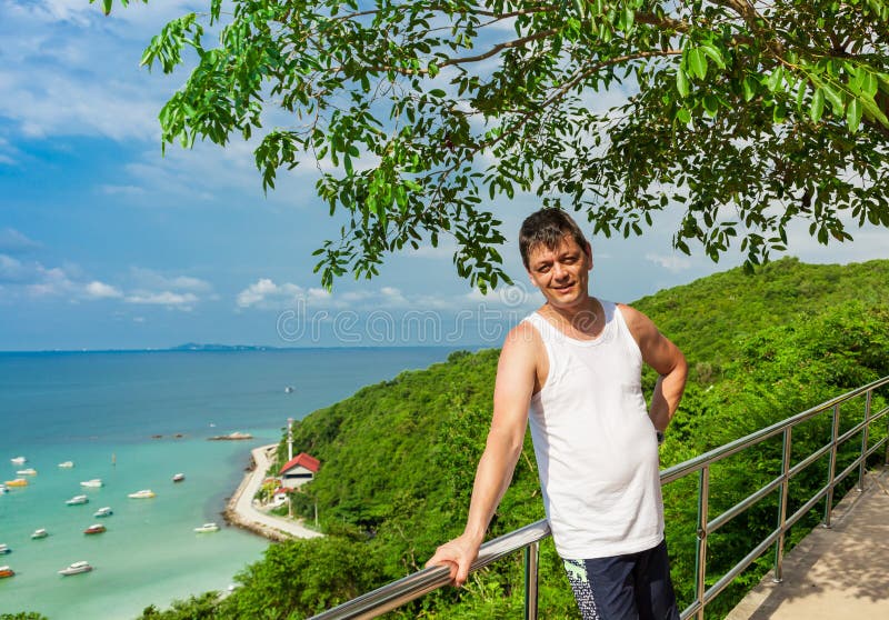 A man at a lookout point stock photo. Image of cloud - 65667904