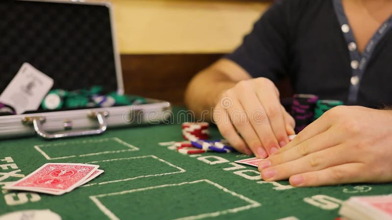 Man Looks and Hides His Cards during Poker Game on Stock Video - Video ...
