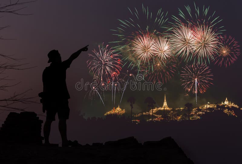 The Man Looks Holiday Fireworks in the Evening Sky Stock Photo - Image ...
