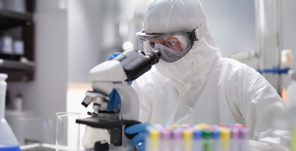 A Man in Looks through an X-ray Microscope Stock Image - Image of glass ...