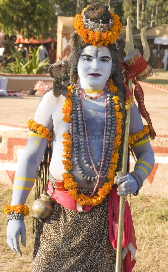 A man in Lord Shiva getup stock photo. Image of trident - 21625096
