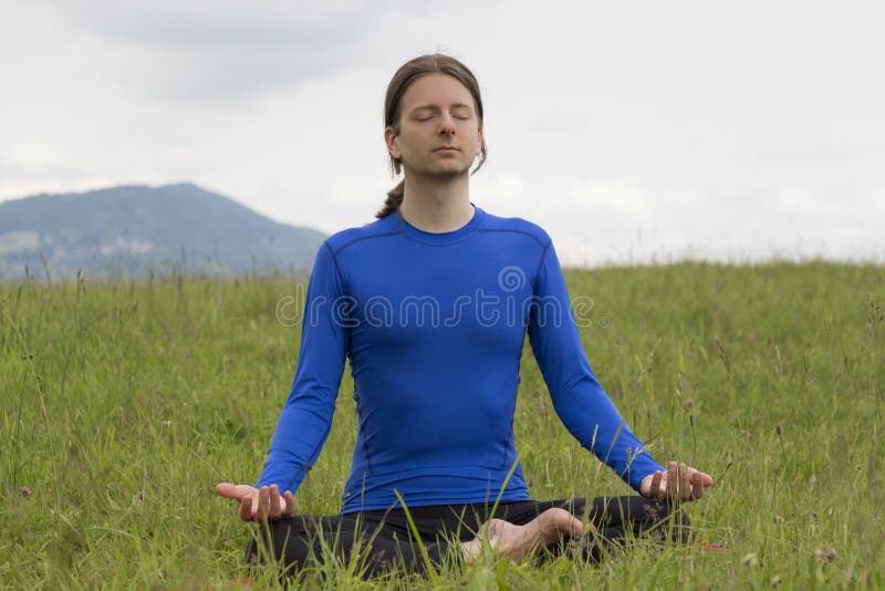 Man in Lotus Pose Meditating during Yoga Outdoors Stock Photo - Image ...