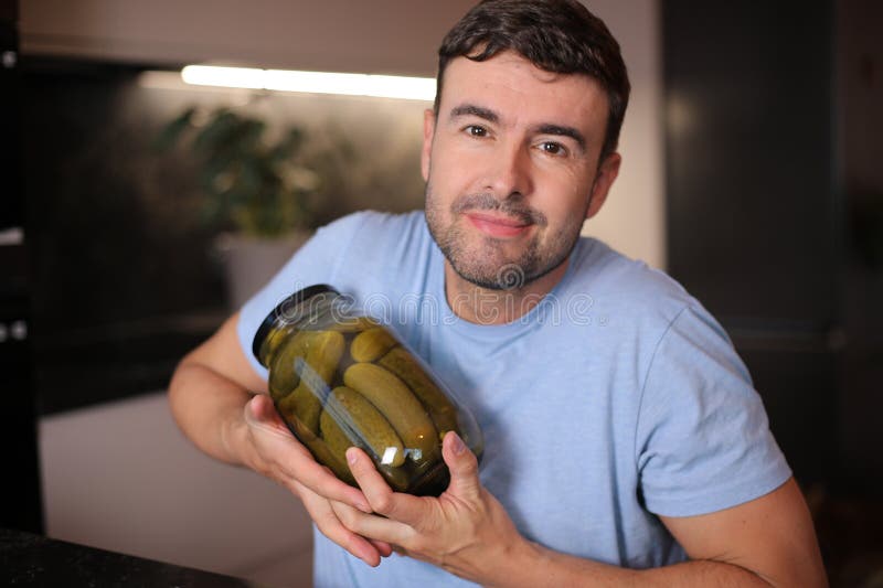 Man that really Loves Pickles Stock Photo - Image of saline, pickles ...