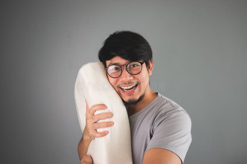 The man loves pillow. stock photo. Image of comfort, handsome - 60963322