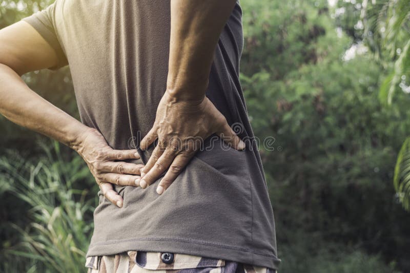 Man Lower Back Pain. Adult Man Suffering from Back Pain Stock Photo ...