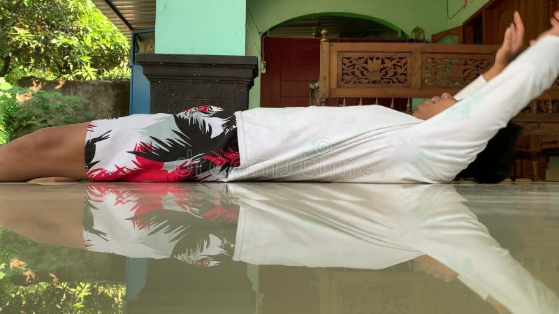 A Man Lying Down on the Floor Tired after Working Out Stock Footage ...