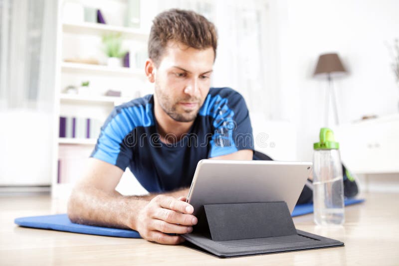 Athletic Man in Side Planking Using Foam Roller Stock Photo - Image of ...