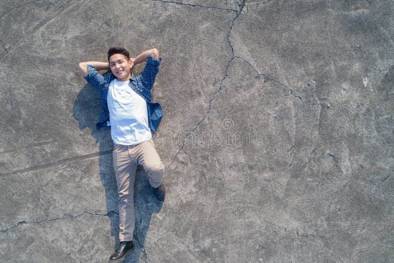 Man lying on floor stock photo. Image of security, asian - 112204724