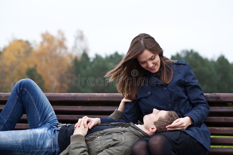 Girl sitting on lap men stock photo. Image of green, relations - 27457044