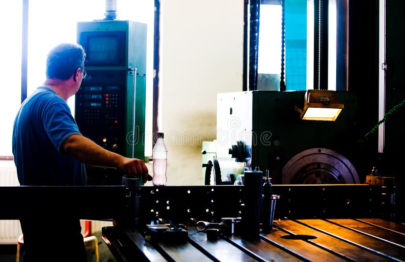 Man and machine stock photo. Image of laborer, experienced - 18750558
