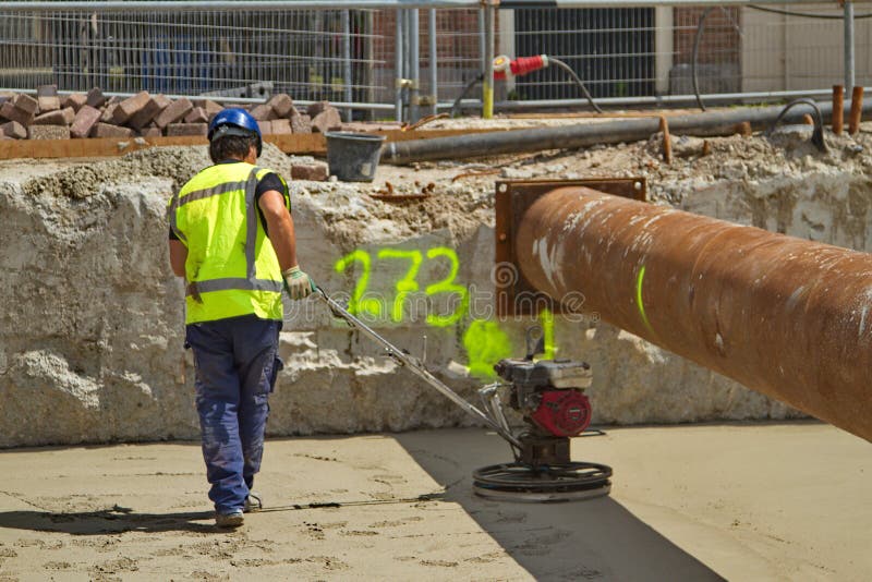 Working Man in a Construction Site Editorial Photography - Image of ...