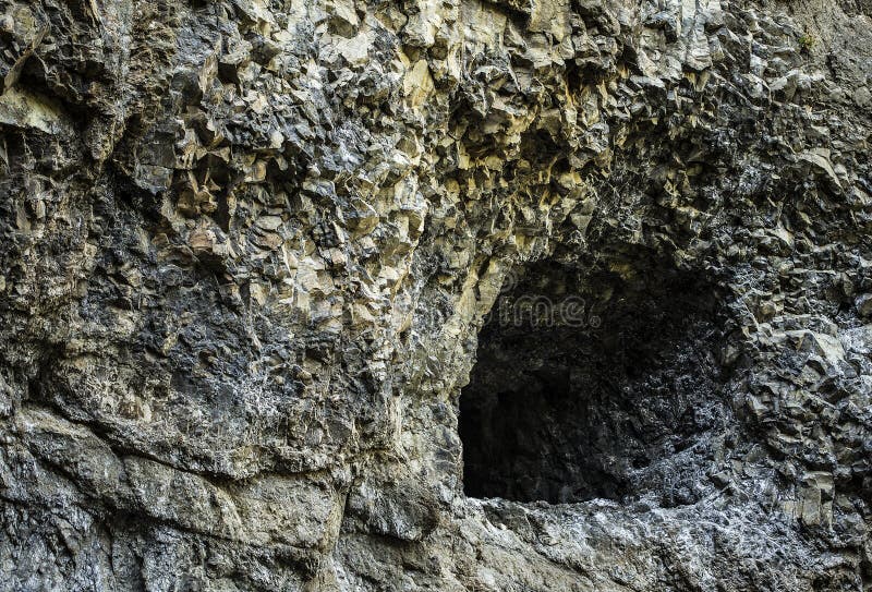 Man made miners rock hole stock image. Image of stone - 79054595