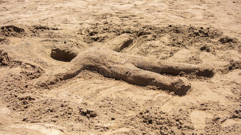 A Man Made of Sand on the Beach Stock Image - Image of hole, texture ...