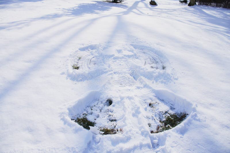 Snow angel shape stock image. Image of shape, relief - 214325479