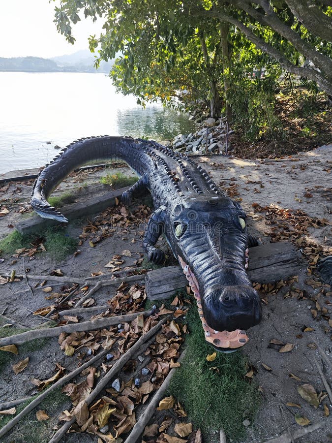Man-made Wooden Crocodile Bench Along the Public Seaside Stock Image ...