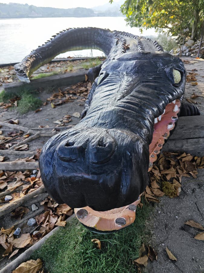 Man-made Wooden Crocodile Bench Along the Public Seaside Stock Image ...
