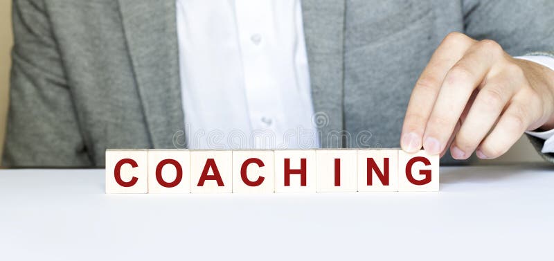 Man Made Word COACHING with Wood Blocks Stock Image - Image of concept ...