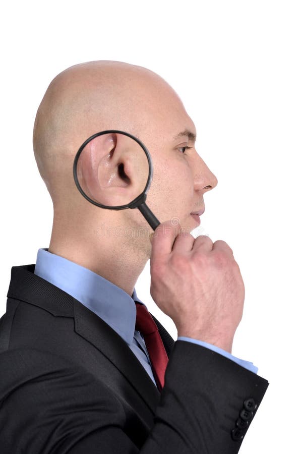 Man with Magnifying ear stock photo. Image of closeup - 37946554