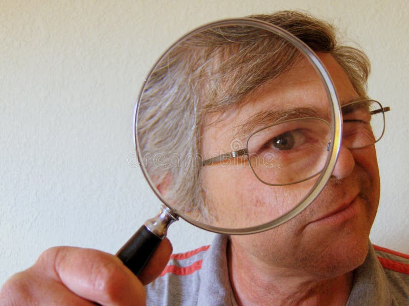 Man with magnifying glass stock photo. Image of looking - 5258516