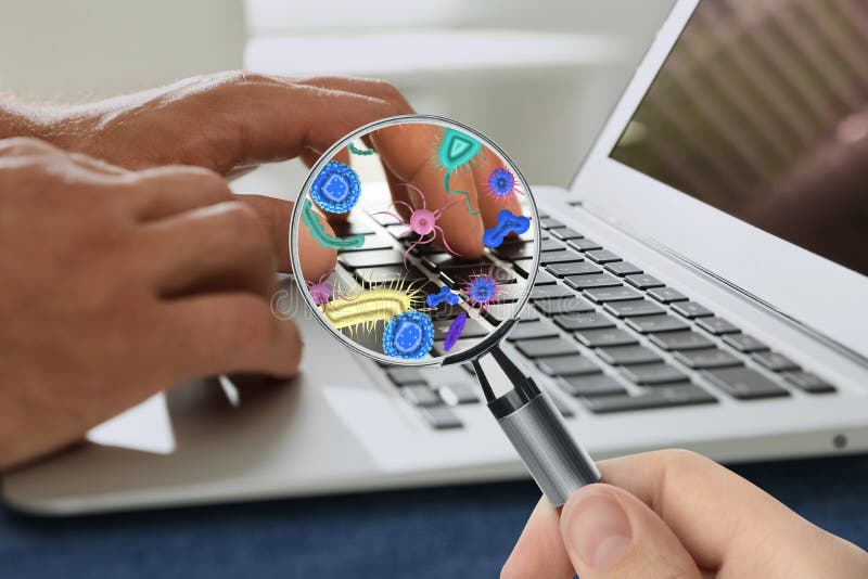 Man with Magnifying Glass Detecting Microbes on Laptop Keyboard ... Man with Magnifying Glass Detecting Microbes on Laptop Keyboard ...