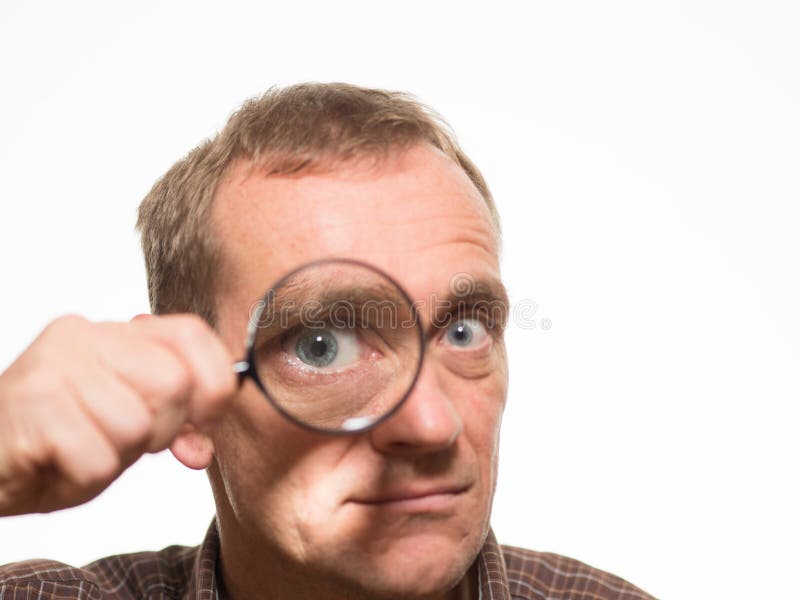 Man with magnifying glass stock image. Image of watch - 47288089