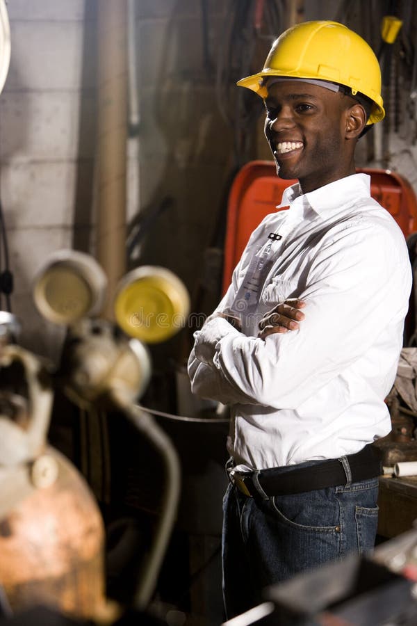 Man in maintenance room stock photo. Image of arms, storage - 10695106