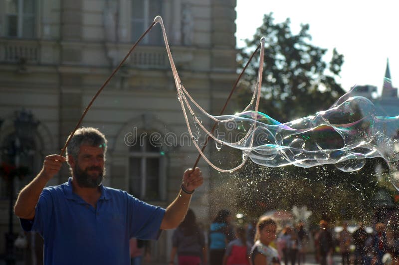 Man Makes Big Bubbles on the Street Editorial Photography - Image of ...