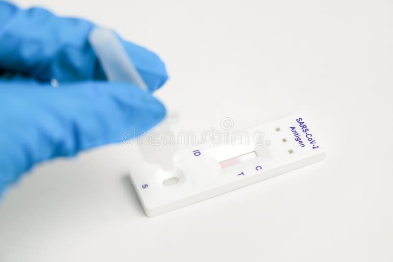Man Makes a Covid-19 Antigen Pcr Test Macro. the Test Showed a Positive ...